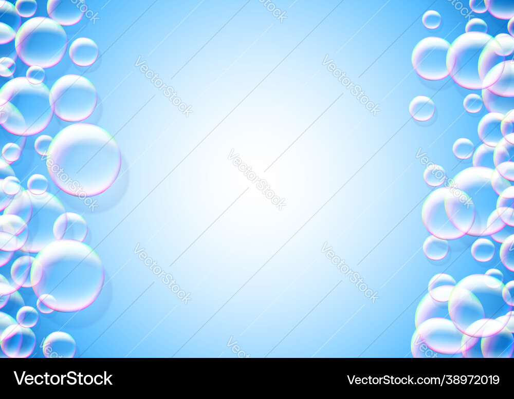 Soap bubbles abstract blue background with rainbow