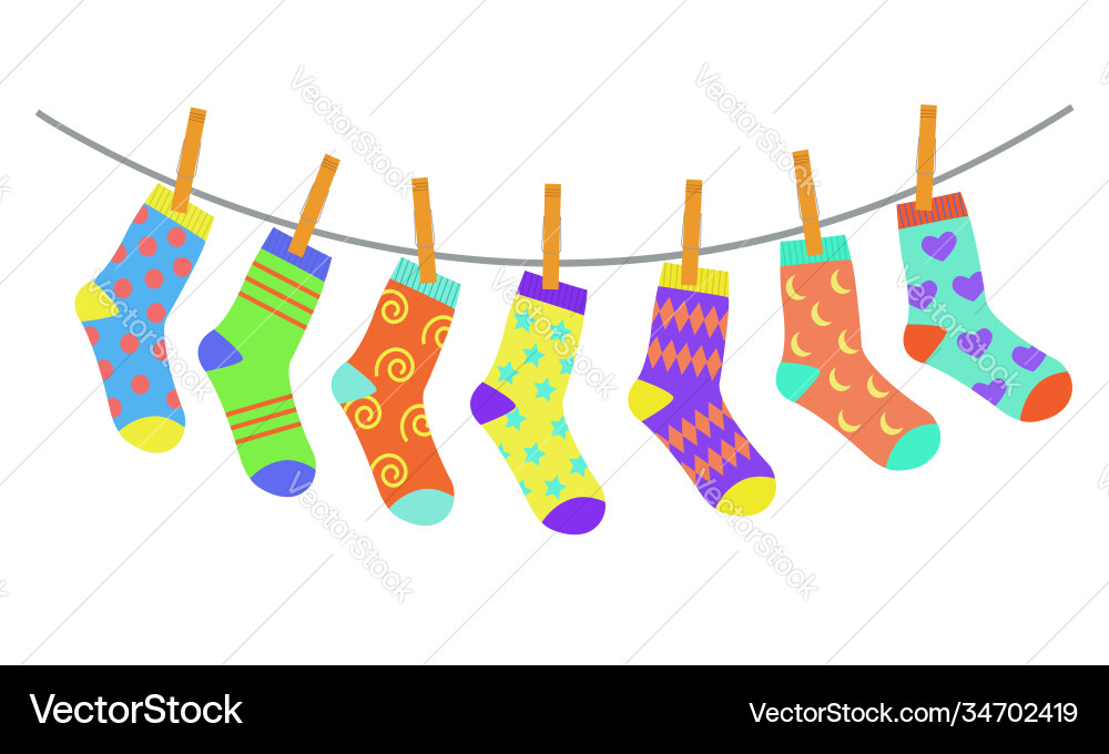 Set colorful bright children socks drying on Vector Image