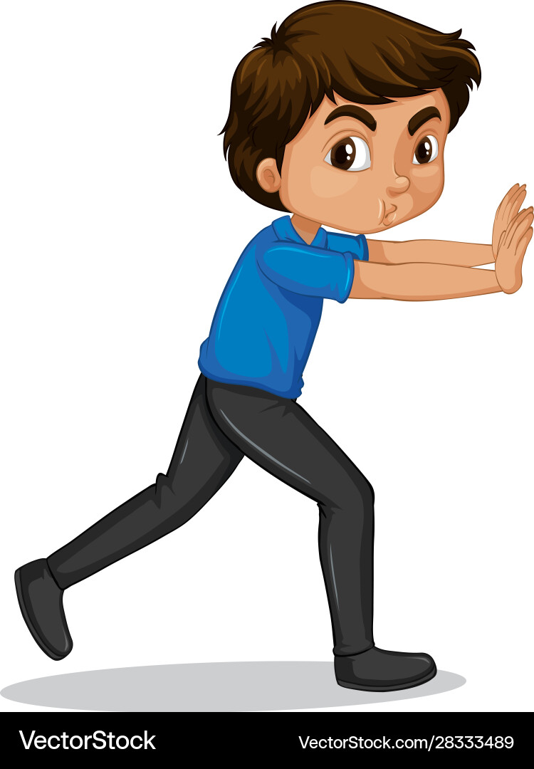 Boy in blue shirt pushing wall on white background