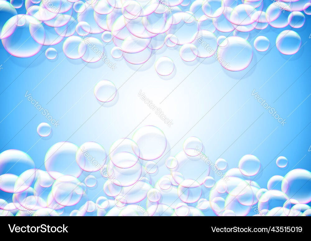 Soap bubbles abstract blue background with rainbow