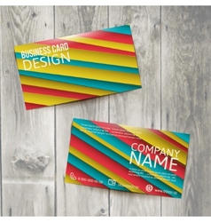 Creative business card on the wooden table Vector Image