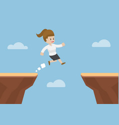 Businesswoman jump through gap from cliff Vector Image
