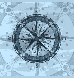 Grunge blue background with compass rose Vector Image