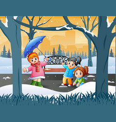 Cartoon kids playing with snow isolated on a white